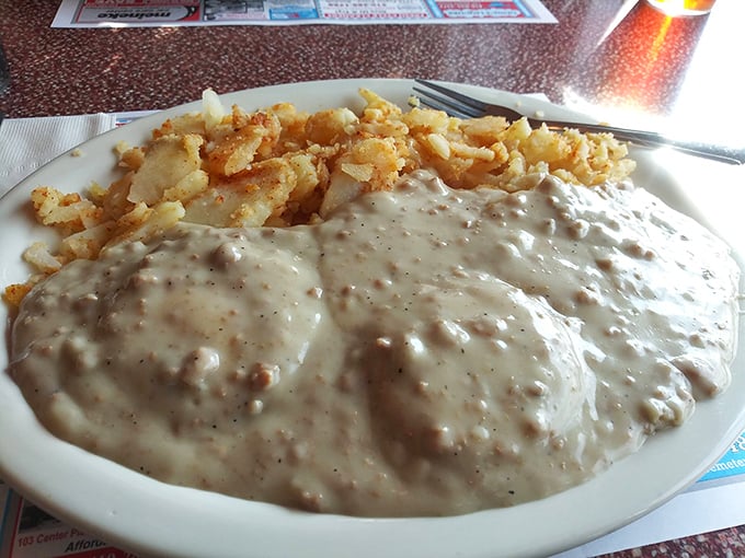 Biscuits and gravy—the breakfast that hugs you from the inside. This plate doesn't judge your life choices; it celebrates them.