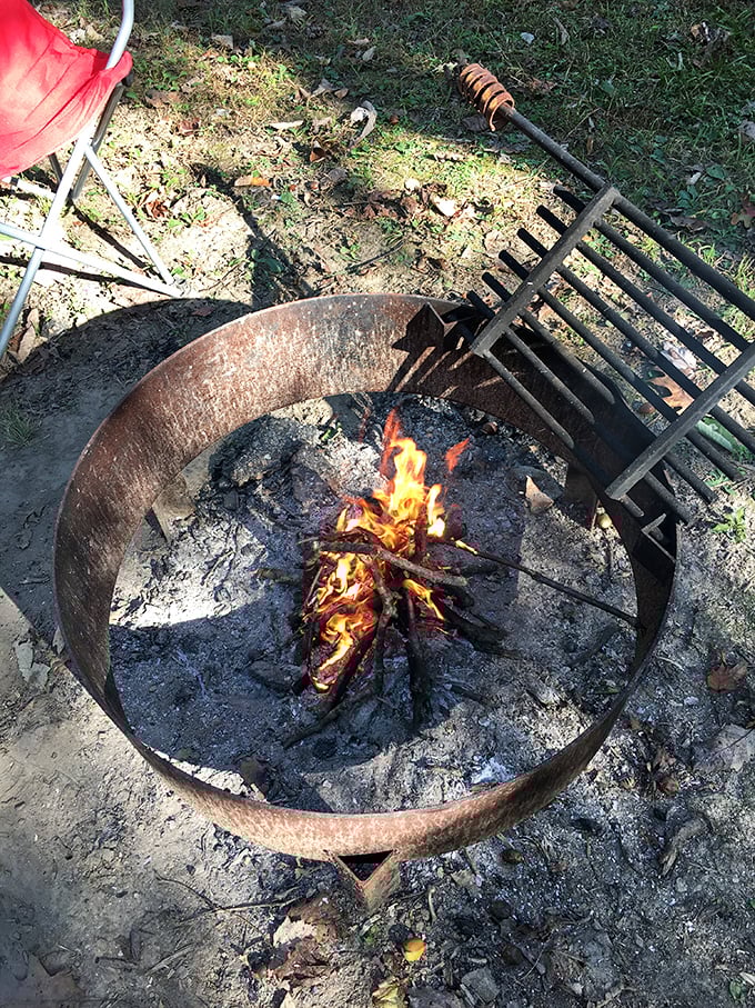 Campfire cooking at its most primal – where food tastes better simply because you're eating it outdoors.