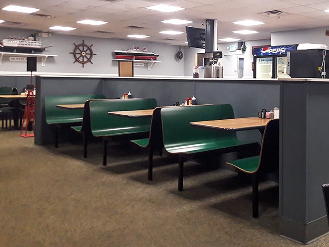 These booths have heard everything from business deals to marriage proposals – each one positioned just right for privacy without isolation.