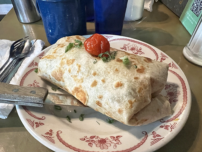 This breakfast burrito isn't messing around – stuffed to capacity and ready to cure whatever ailed you from the night before.