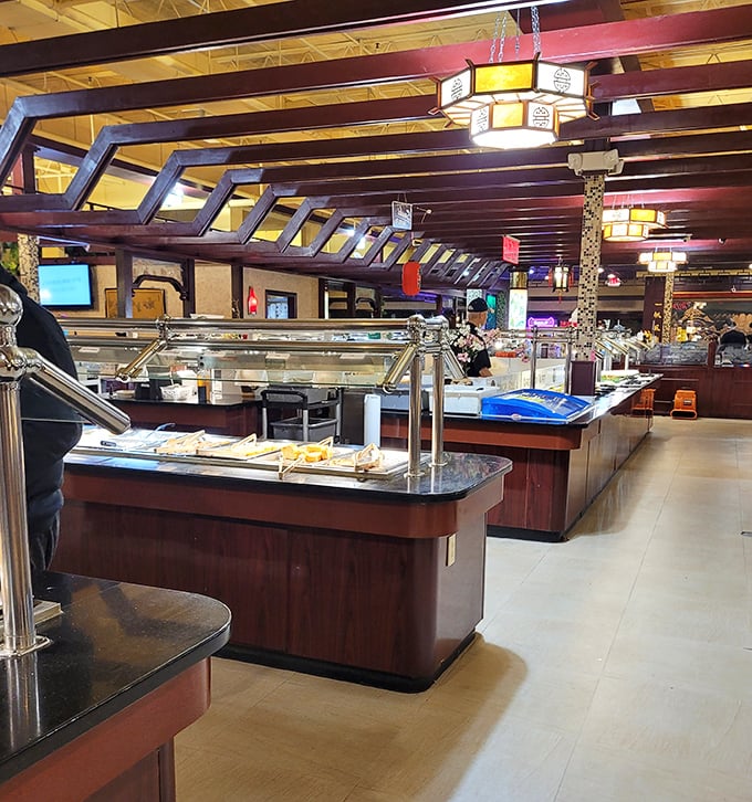 Buffet stations stretch toward the horizon like a food lover's yellow brick road, each turn revealing new culinary treasures.