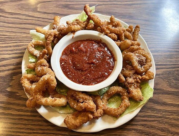 Crispy calamari that shatters with each bite—the perfect shareable appetizer that disappears faster than you'd expect.
