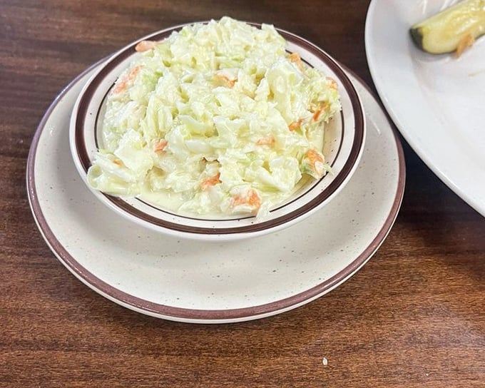 Coleslaw that knows its role—creamy, crunchy, and refreshingly straightforward. The perfect supporting actor to any main dish drama.