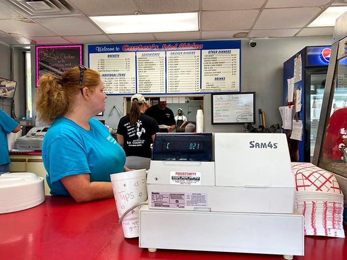 Where magic happens daily – the register may be old-school, but the chicken-frying skills are timeless.