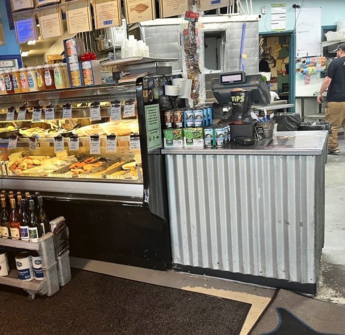 Where the magic happens—a counter that separates mere mortals from the seafood wizards who transform ocean treasures into edible art.
