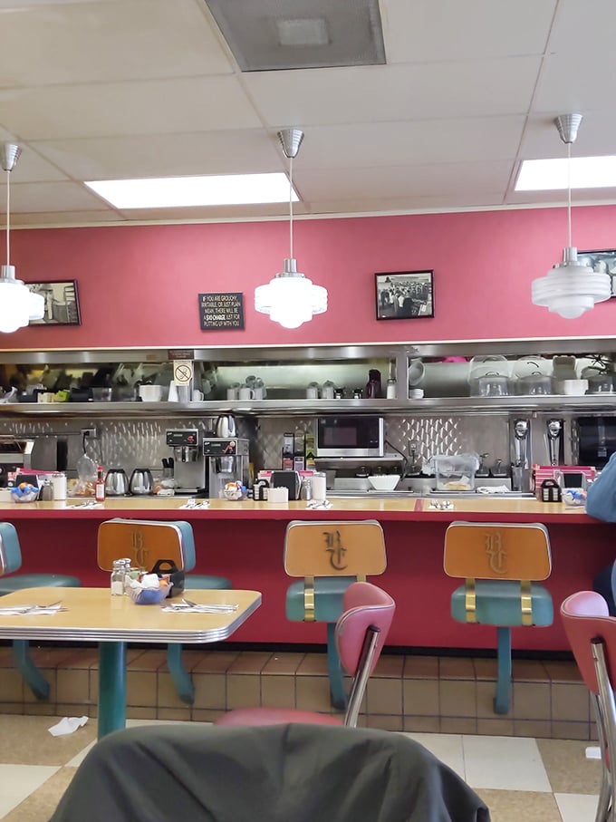 That counter with its "BC" monogrammed seats isn't just furniture—it's front-row tickets to the best breakfast theater in Napa.