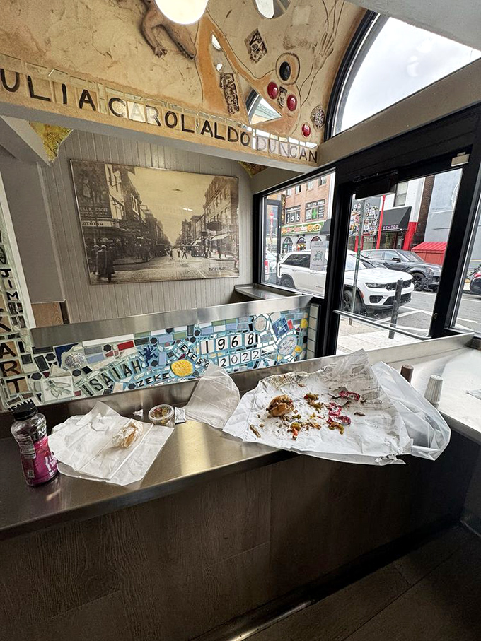 The aftermath of cheesesteak bliss – where empty wrappers tell tales of sandwiches that were here just moments ago.