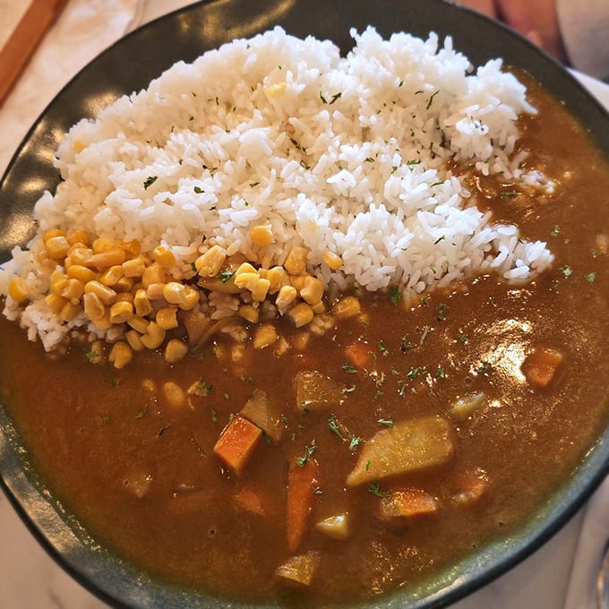 Japanese curry that hugs your rice like an old friend – warming, familiar, and impossible to resist.