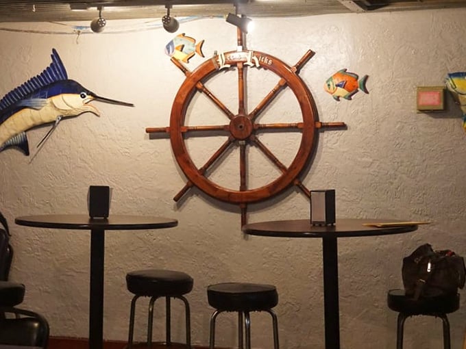 That ship wheel isn't just decoration—it's steering this establishment through decades of food trends without ever losing its course.