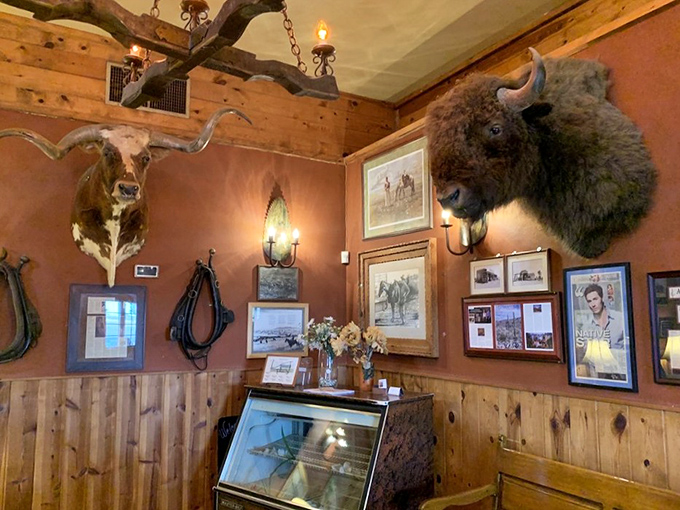The taxidermy watching over your meal isn't judging your order—these walls tell stories of Arizona's ranching heritage with authentic Western charm.