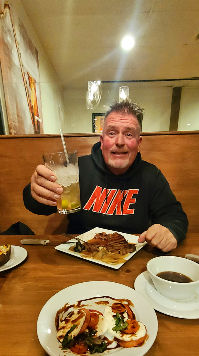 Every table tells a story—this one featuring what appears to be a very happy diner celebrating the universal language of "this tastes amazing!"