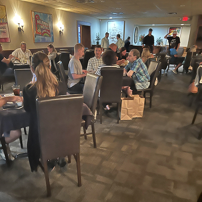 Where memories are made between bites—diners enjoying the timeless pleasure of good company and better food.