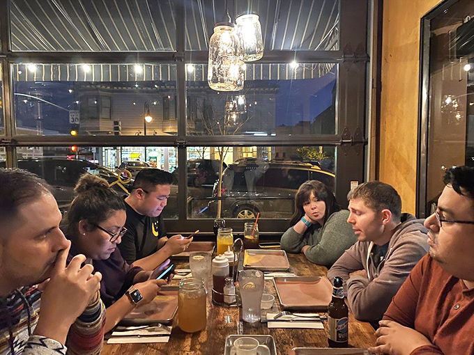 The universal language of good barbecue: heads down, forks moving, conversation temporarily suspended for more important matters.
