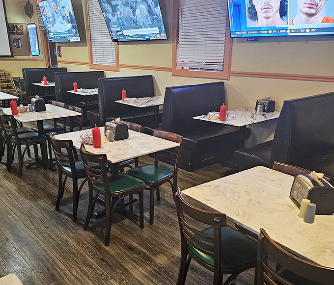 Tables arranged for both privacy and community—the perfect balance for those "I want to be alone but not really alone" dining moments. Red squeeze bottles stand ready for action.