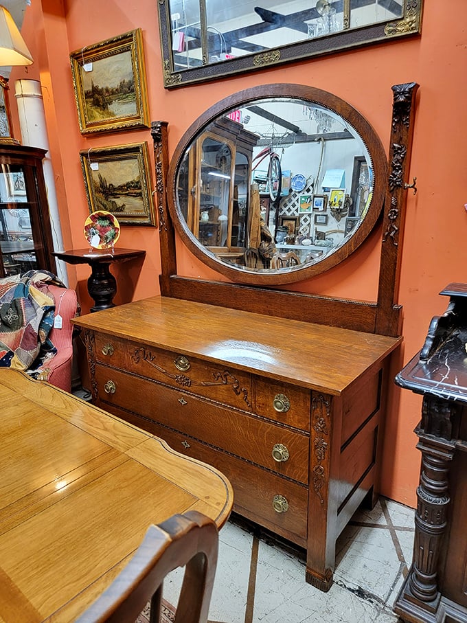 This oak dresser with circular mirror doesn't just reflect your face—it reflects an era when furniture was built to outlast its owners.