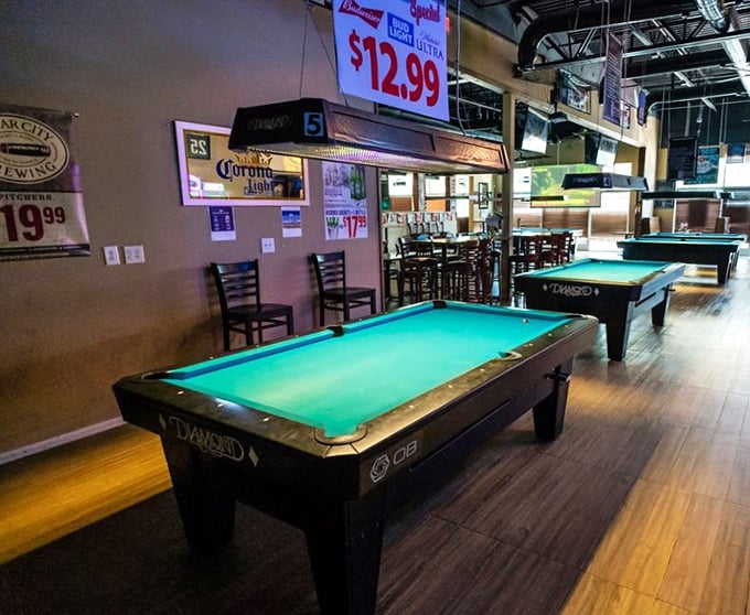 Pool tables waiting for your next friendly wager—because sometimes the best entertainment isn't on those big screens, it's right at your fingertips.