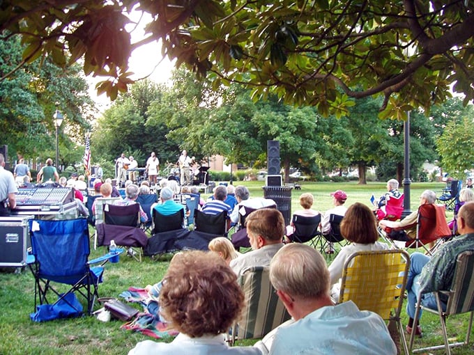 Summer concerts in the park – where locals bring folding chairs older than some of the musicians. Community happens when phones go into pockets.