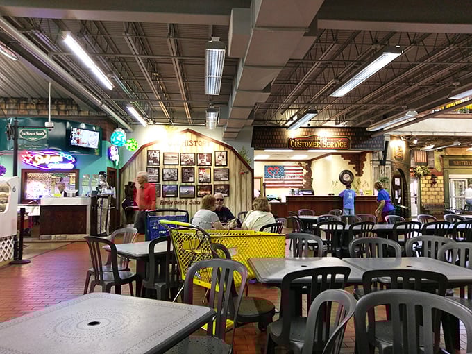 The food court—where shopping stamina is restored and strangers become temporary friends united by the universal language of "where did you find that?"