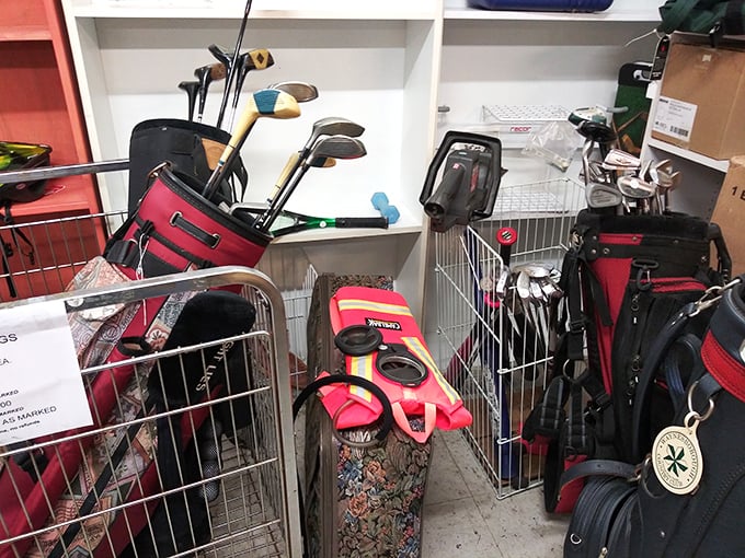 Golf club corner: where retired drivers and putters await their second act. That pink bag has "impulse purchase with a story" written all over it.