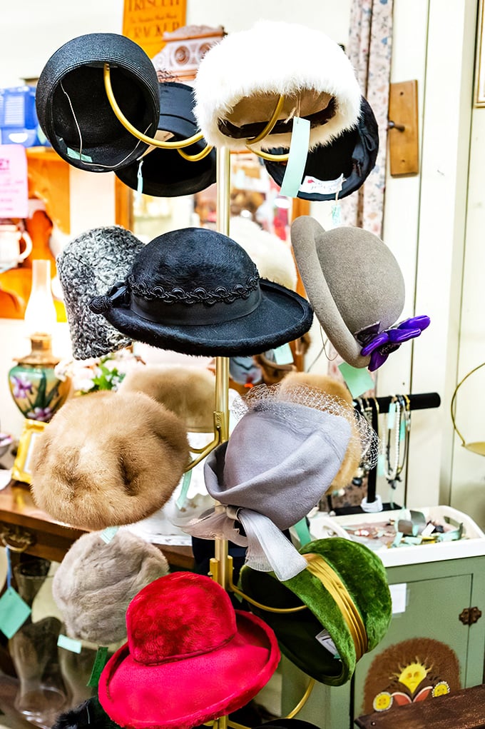 A millinery time machine displaying decades of hat fashion—from fur-trimmed elegance to that red number perfect for your next Kentucky Derby party.