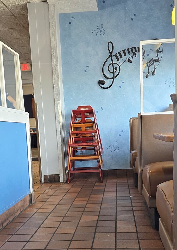 Musical notes dance across blue walls—a charming nod to the restaurant's melodious name and the harmony of a well-executed meal.