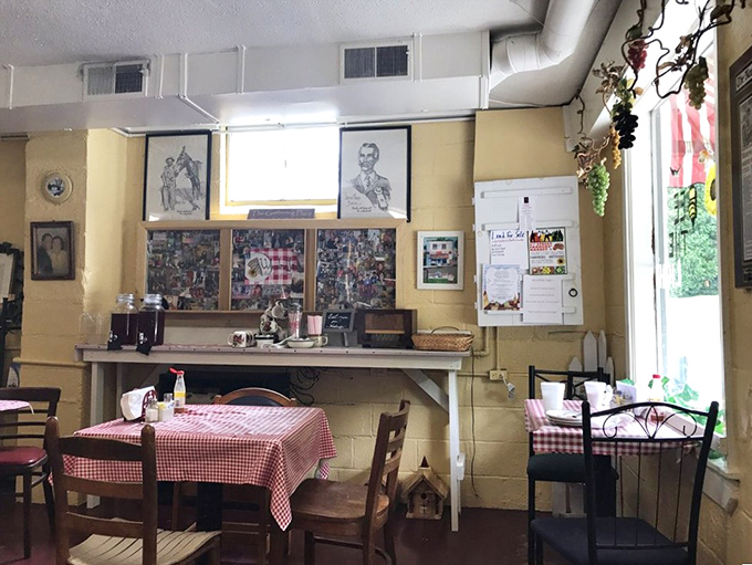 Red-checkered tablecloths and simple chairs—because when the food is this good, you don't need fancy furniture to keep people coming back. 