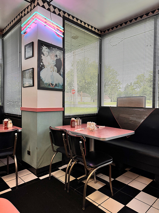 Neon lights, Marilyn on the wall, and booths designed for comfort—this corner spot captures diner perfection in three dimensions.