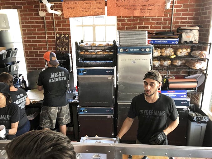 Behind the scenes, the "Meat Slinger" works his craft with the precision and focus of a surgeon, but with way better results.