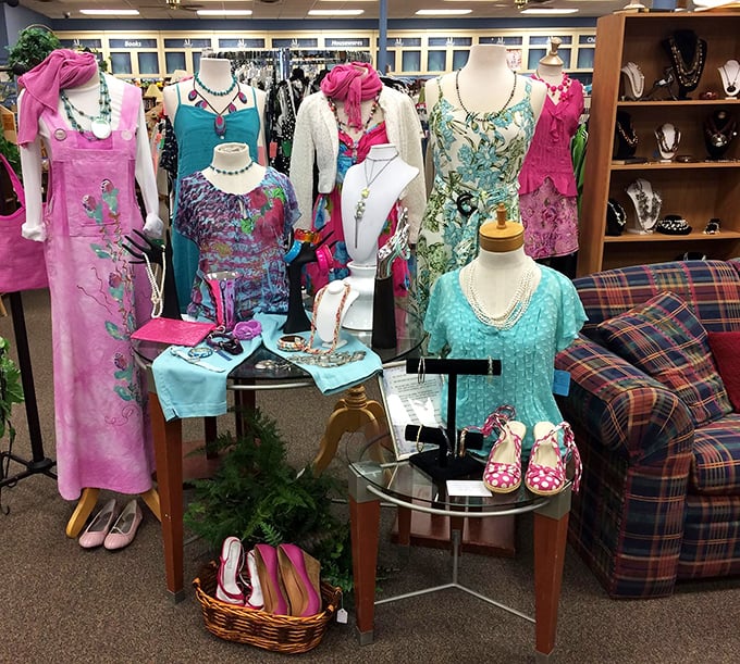 A fashion vignette that tells a story in turquoise and pink. Those mannequins aren't just displaying clothes—they're suggesting entire personalities.