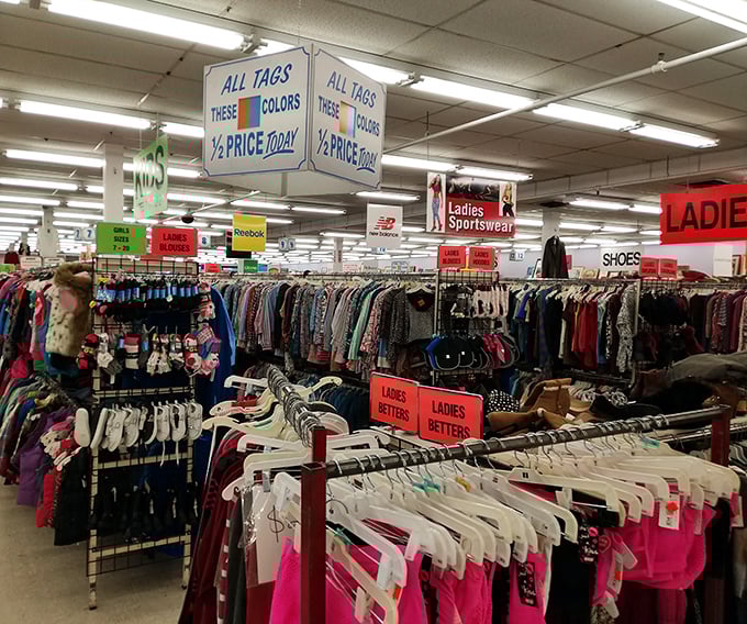 Half-price tag day—when the thrill of the hunt gets even more exciting. The red signs practically shout "bargain alert!"