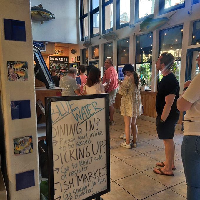 The line forms here for seafood nirvana! These patient patrons know that good things come to those who wait—especially when it's fresh catch.