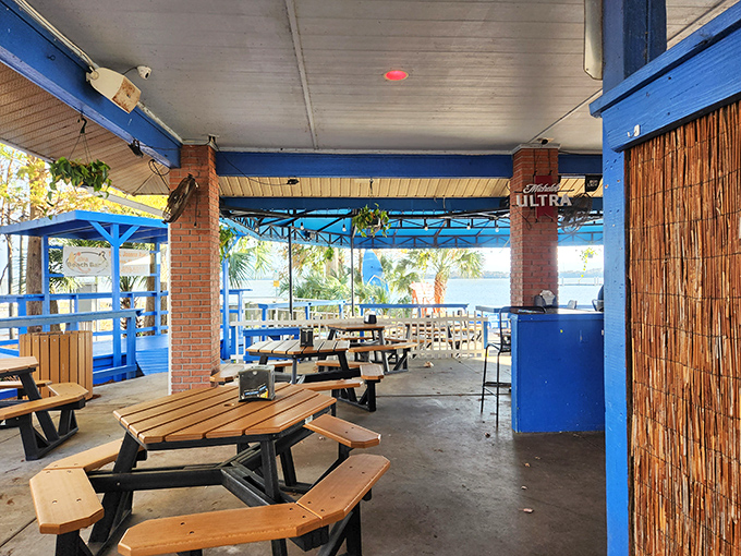 Picnic tables under the covered patio offer shade without sacrificing that essential "I'm dining outdoors" feeling we all crave.