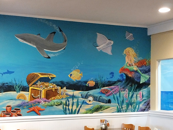 This underwater mural might be the closest you'll get to dining with mermaids. Unless you count the seafood that recently lived there.