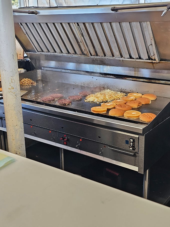 The flat-top grill—where burger patties and buns transform from mere ingredients into the stuff of local legend right before your eyes.