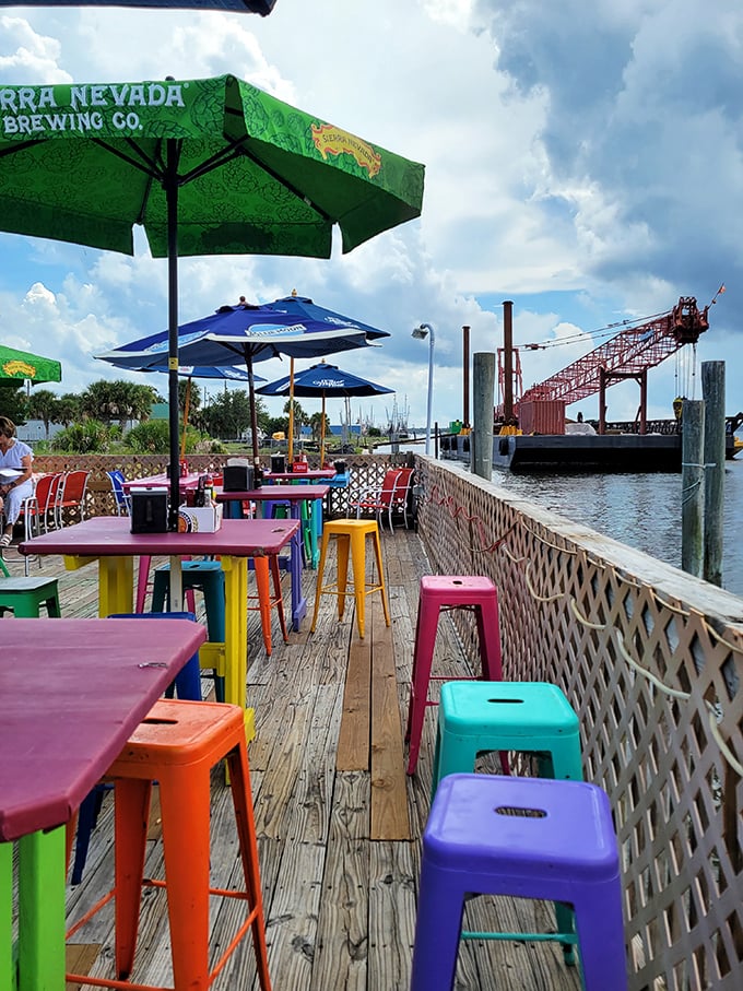 Rainbow-colored seating that's as vibrant as the seafood. This deck doesn't just offer views—it offers front-row seats to coastal Florida living.