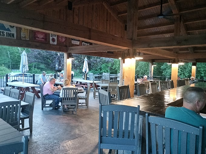 Twilight transforms the patio into an enchanted dining space where summer evenings stretch as long as the conversations.