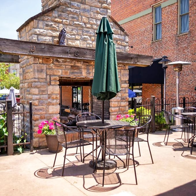The outdoor patio—where summer afternoons stretch into evening and conversations flow as freely as the craft beer. Those flowers aren't just pretty; they're mood enhancers.