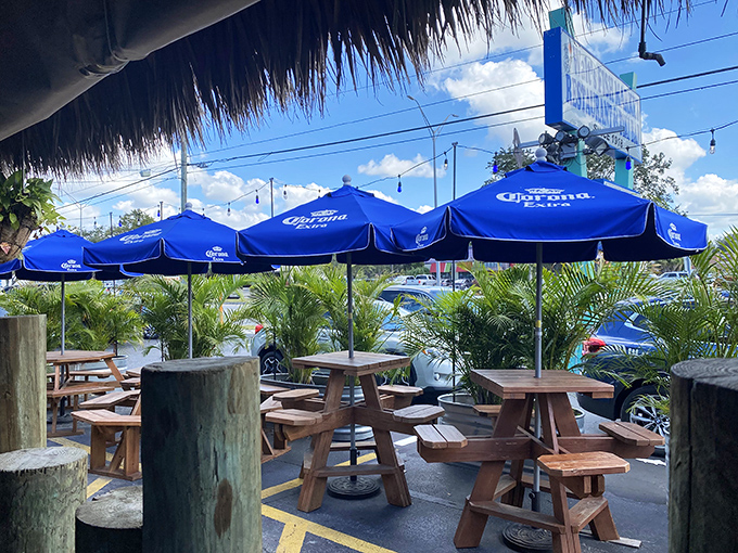 Outdoor seating under those Corona umbrellas – where the Florida breeze carries conversations and the scent of the day's catch.