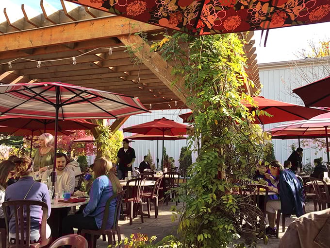 The garden patio doesn't just offer fresh air—it provides a leafy sanctuary where breakfast tastes even better under Indianapolis skies.