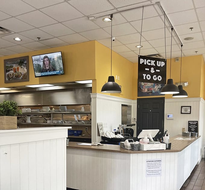 The pickup counter – where takeout dreams come true for those mornings when pants with real waistbands seem like too much commitment.