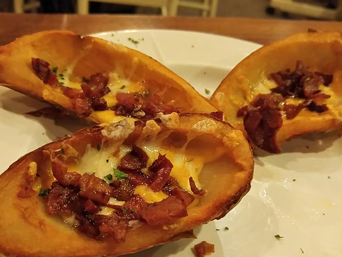 Potato skins loaded with bacon and cheese – the 1980s appetizer that deserves its comeback tour more than most boy bands.