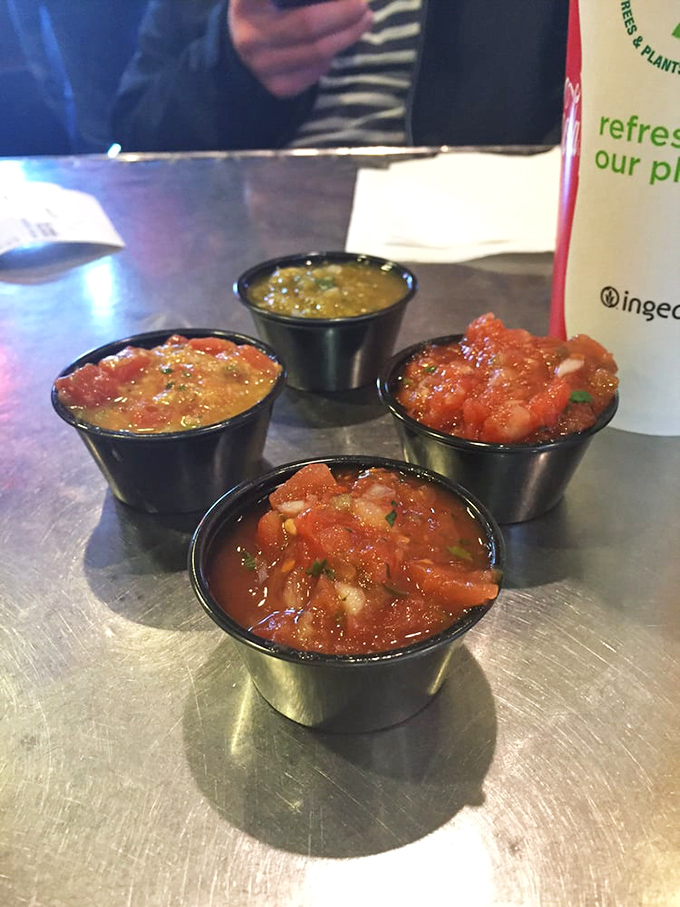 Salsa flights – because choosing just one would be like picking a favorite child. Each one brings its own personality to the party.