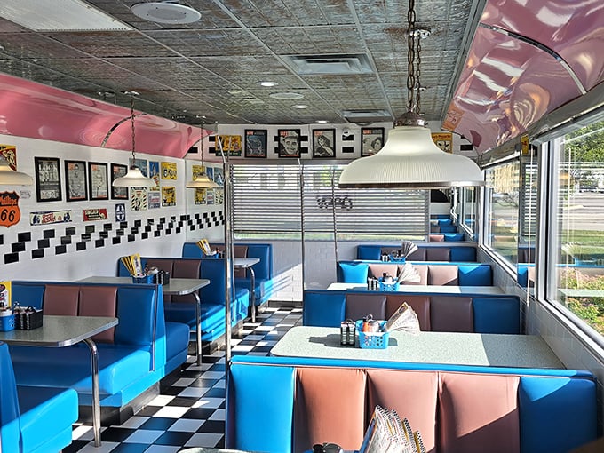 Empty booths waiting for the next wave of hungry patrons. The vintage décor and natural light create the perfect stage for breakfast theater.