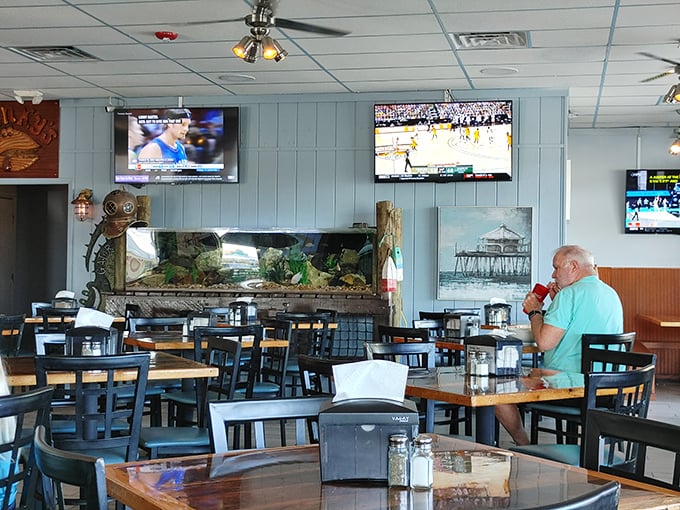 The dining room strikes that perfect balance—casual enough for flip-flops, nice enough for date night, with an aquarium that reminds you where your dinner came from.