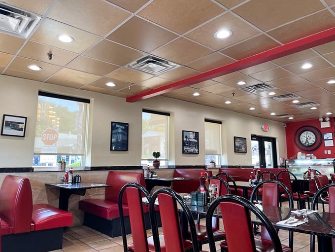 The dining room says "we care about your comfort, not your Instagram feed." Those red booths have supported more happy meals than McDonald's.