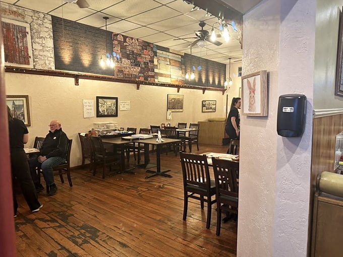 The dining room balances rustic charm with no-nonsense practicality – where the wood floors have supported generations of Pennsylvanians seeking breakfast bliss.