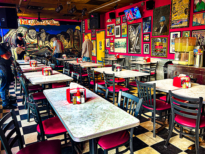 Where barbecue dreams come true—simple tables, vibrant walls, and the promise of plates that will leave you speechless.