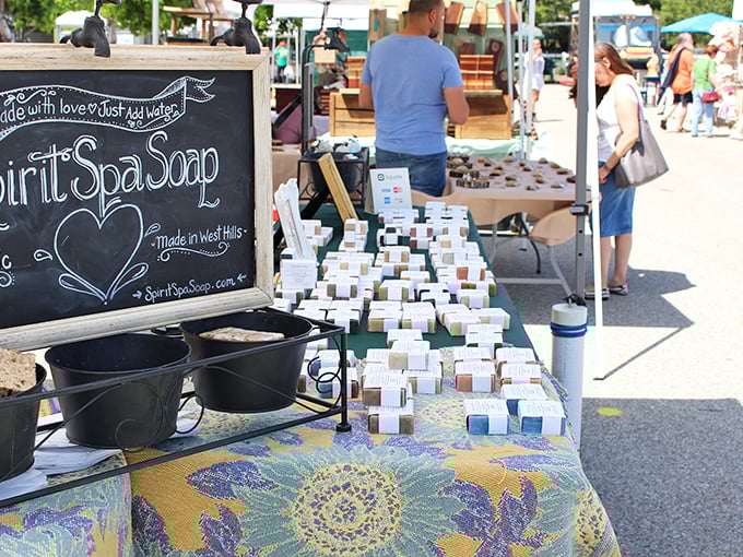 Artisanal soaps lined up like colorful soldiers. Because even treasure hunters deserve to smell better than the inside of a vintage leather jacket.