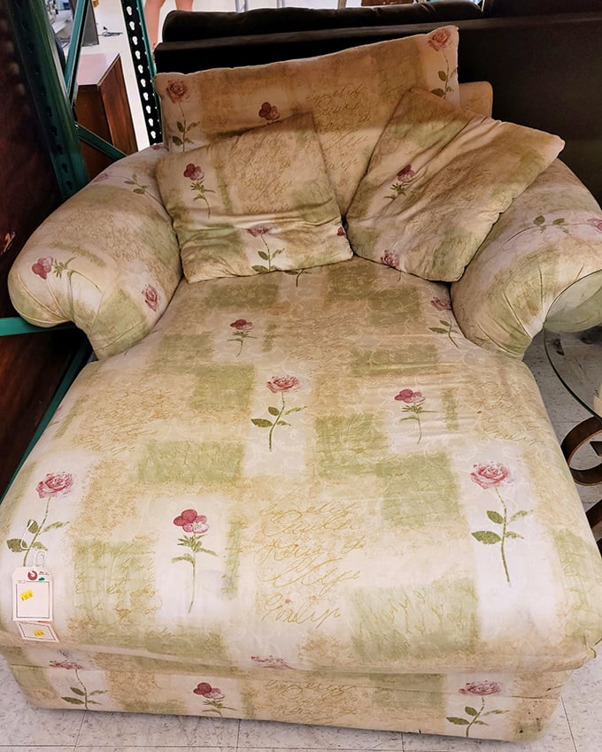 This floral chaise lounge isn't just furniture—it's a time machine to someone's grandmother's living room, complete with phantom cookies and advice.