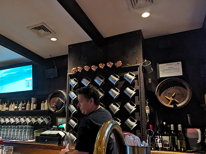 The friendly bartender represents the heart of McNally's – genuine hospitality that makes every guest feel like a welcomed regular.